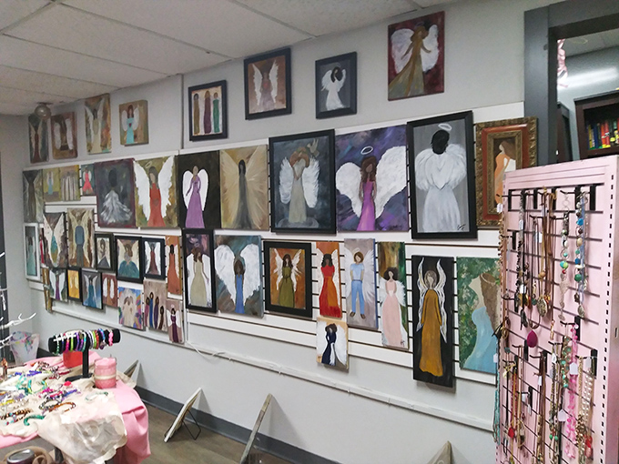 An angel army watches over the art section, their painted wings spreading across canvases that could add character to any blank wall.