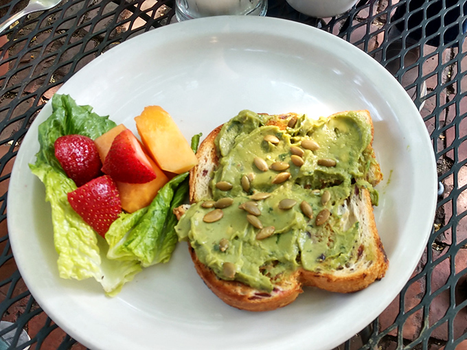 Avocado toast that doesn't require a second mortgage&mdash;just honest ingredients arranged with care and served with fresh fruit.