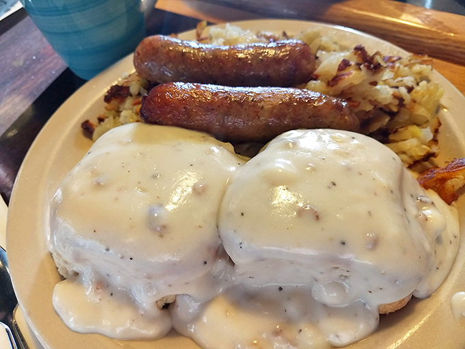 Biscuits and gravy with sausage links—the breakfast of champions. When the gravy is this good, you'll contemplate drinking it straight.