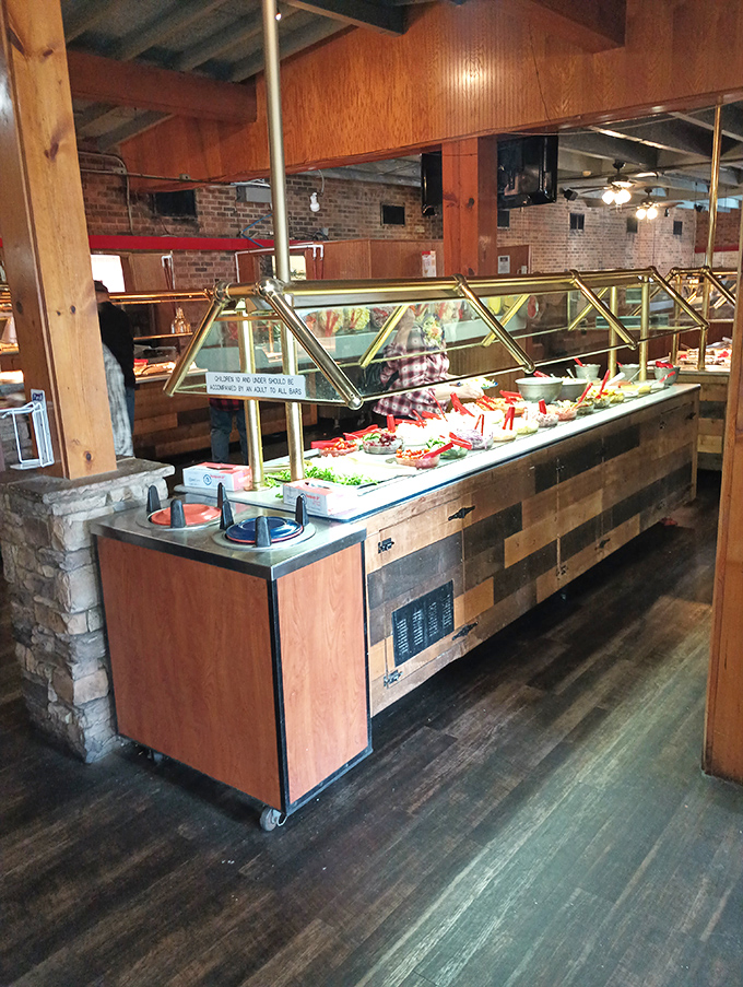 The buffet line stretches like a runway of culinary delights—each station a different destination on your journey to satisfaction.