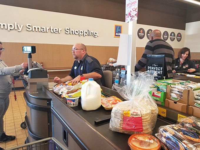 The legendary ALDI checkout&mdash;where cashiers scan groceries faster than you can say "I brought my own bags" and your total is always a pleasant surprise.