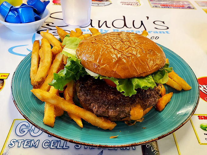 A burger that doesn't need fancy aioli or artisanal buns &ndash; just honest beef, fresh toppings, and the kind of fries that disappear one by one until you're surprised they're gone.