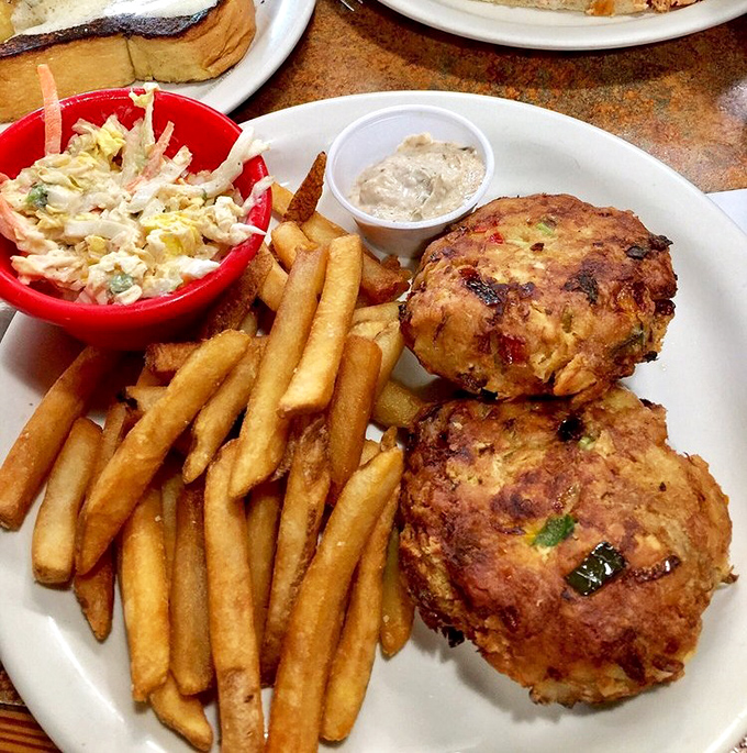 Crab cakes that actually taste like crab instead of breadcrumbs with seafood aspirations. Florida's coastal bounty at its finest.