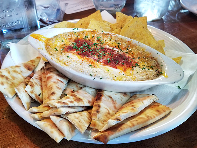 This crab dip isn't just an appetizer—it's the opening act of a culinary concert that has crowds coming back for encore performances.