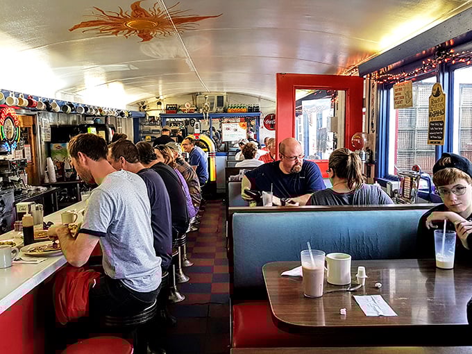 The full diner experience—where strangers at counters become temporary friends united by coffee and the universal language of "pass the ketchup."