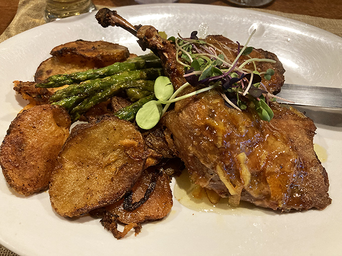 Duck confit that would make a French chef nod in approval. Crispy skin, tender meat, and sides that don't just play supporting roles.