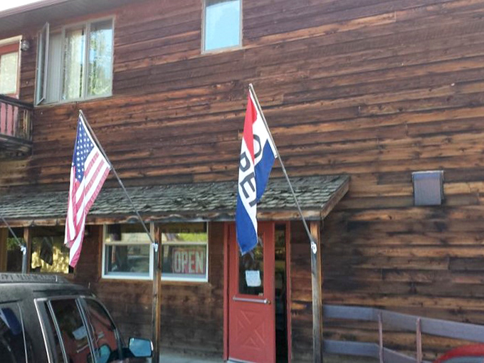 American flag on one side, OPEN flag on the other&mdash;this entrance is basically the gateway to patriotic eating. Liberty and biscuits for all!