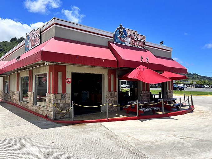 On sunny days, that red awning isn't just for shade – it's a beacon calling to hungry travelers like a taco lighthouse.