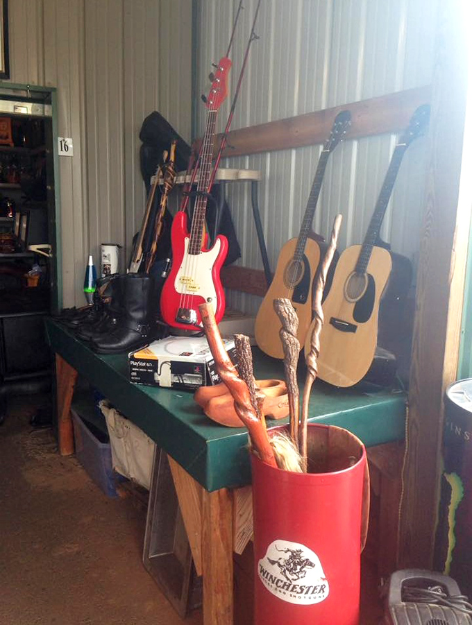 Musical possibilities lean against the wall, each guitar silently promising to turn your living room into a potential concert venue.