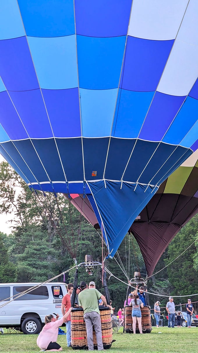Hot air balloons bring a splash of color to Kentucky skies. Up, up and away over Lake Malone's shimmering waters.