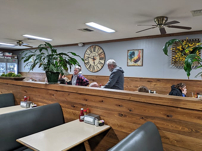 Plants, ceiling fans, and conversations that flow as easily as sweet tea. The booths aren't just seating&mdash;they're front-row tickets to authentic Alabama living.