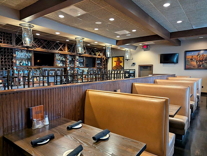 Booths lined up like soldiers ready for the dinner battle ahead—comfortable enough for lingering, stylish enough for that anniversary dinner.