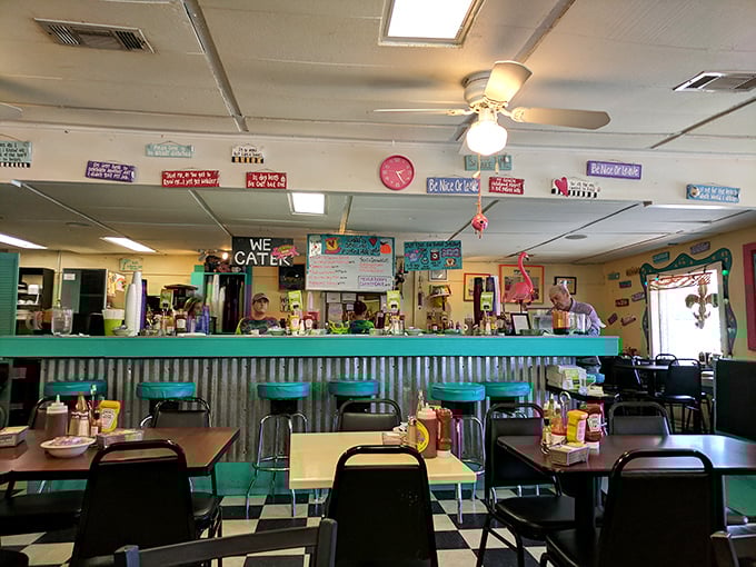 The counter seating offers front-row tickets to the breakfast theater, where coffee flows as freely as the conversation.