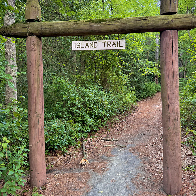 The Island Trail entrance stands like a portal to adventure. What lies beyond? Only one way to find out (spoiler: it's gorgeous).