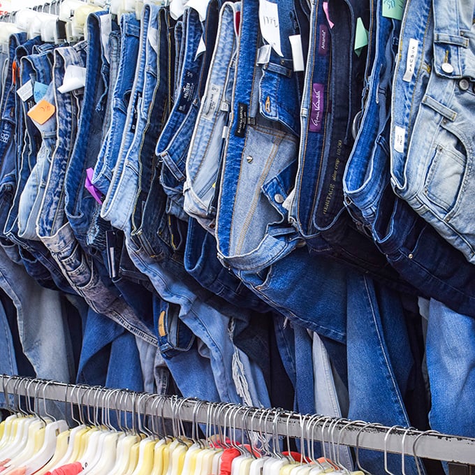 The denim wall—where every wash, cut, and era of jeans hangs in suspended animation. Finding your perfect pair here is like striking fashion gold.