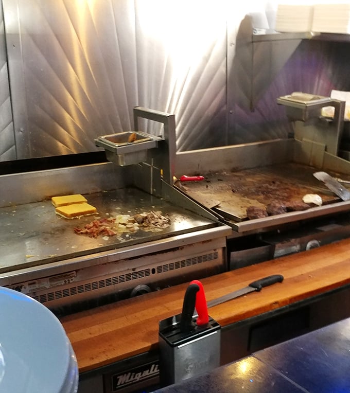 The battlefield where breakfast battles are won: a well-worn grill that's seen more eggs than most chickens have laid.