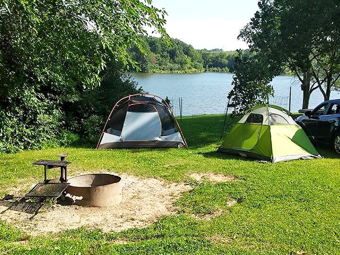 Lakeside camping at its finest—where morning coffee comes with a side of misty water views and birdsong symphonies.