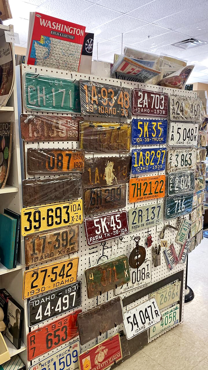 A pegboard timeline of Idaho's automotive history. Each plate represents thousands of miles and countless road trip stories.