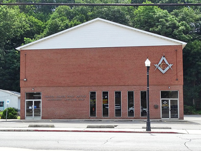 The Post Office doubles as Masonic Lodge, proving that in small towns, buildings multitask just like their residents.