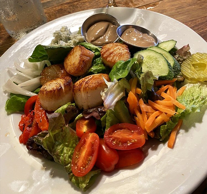 A salad that doesn't apologize for being healthy, especially when those seared scallops are the main attraction.