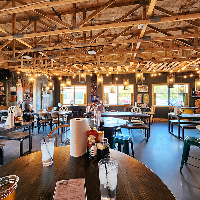 String lights cast a warm glow over mismatched furniture &ndash; proof that perfection isn't about matching, but about feeling right.