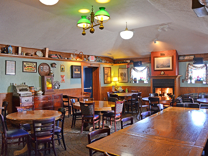 Fireplace, wooden tables, and green walls &ndash; this isn't just dining; it's time travel to a cozy corner of Dublin without the passport hassle.