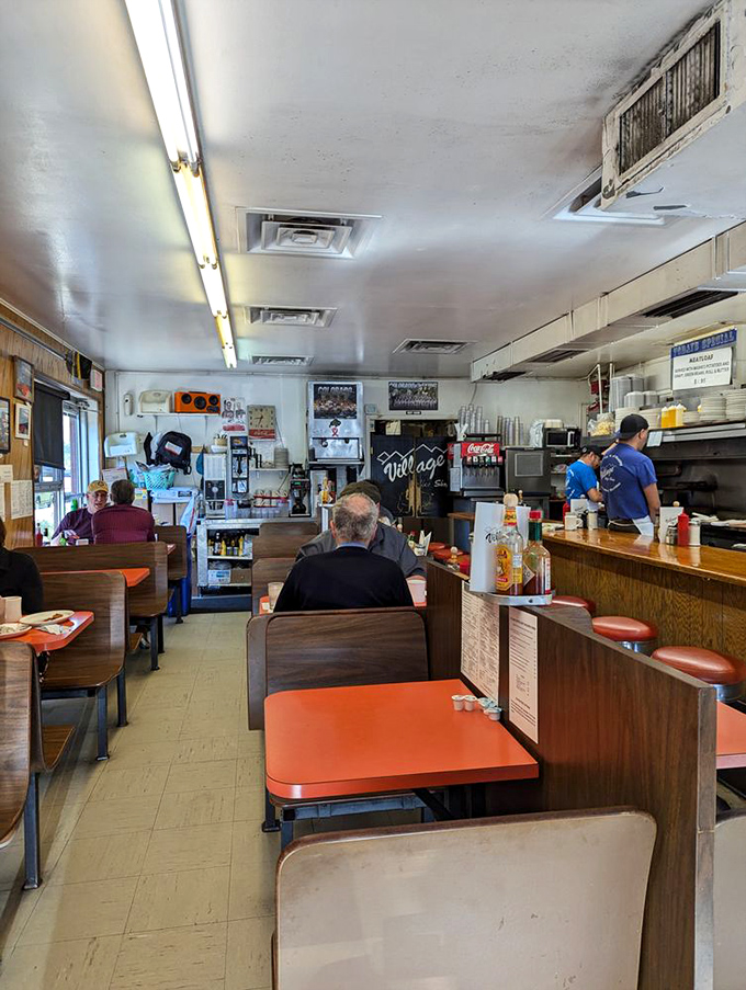 A glimpse into diner life where conversations blend with the sizzle of the grill and coffee flows as freely as the stories.