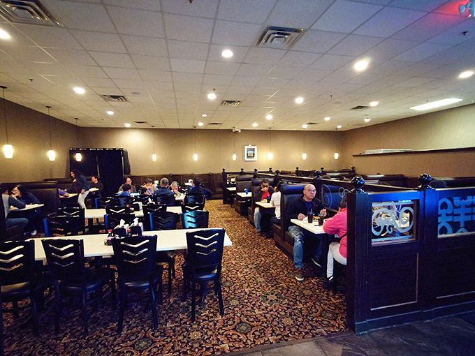 The dining room: where food dreams come true and pants suddenly feel tighter. Comfortable booths for maximum eating efficiency.