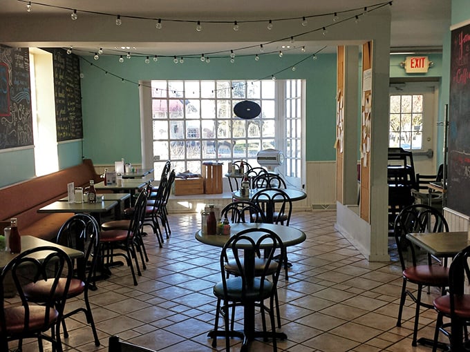 String lights and mint-green walls create a dining space that feels like eating in your coolest friend's perfectly decorated breakfast nook.