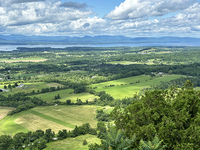 The Champlain Valley unfolds like a living map. Farmland, forest, and water create a patchwork quilt of Vermont's natural beauty.