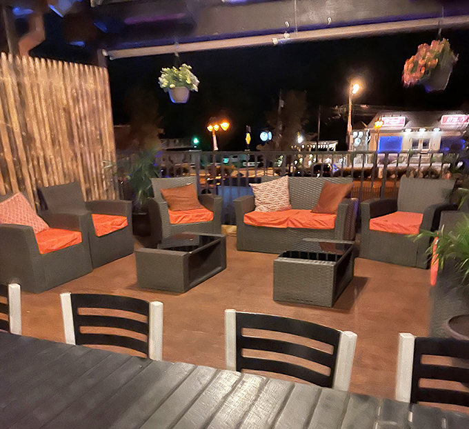 Rails' outdoor lounge area invites you to sink into those coral cushions and contemplate life's big questions &ndash; like whether to order the ribeye or the strip steak.