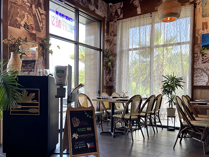 Sunlight streams through sheer curtains, creating the perfect spot to sip calamansi juice and contemplate ordering everything on the menu.