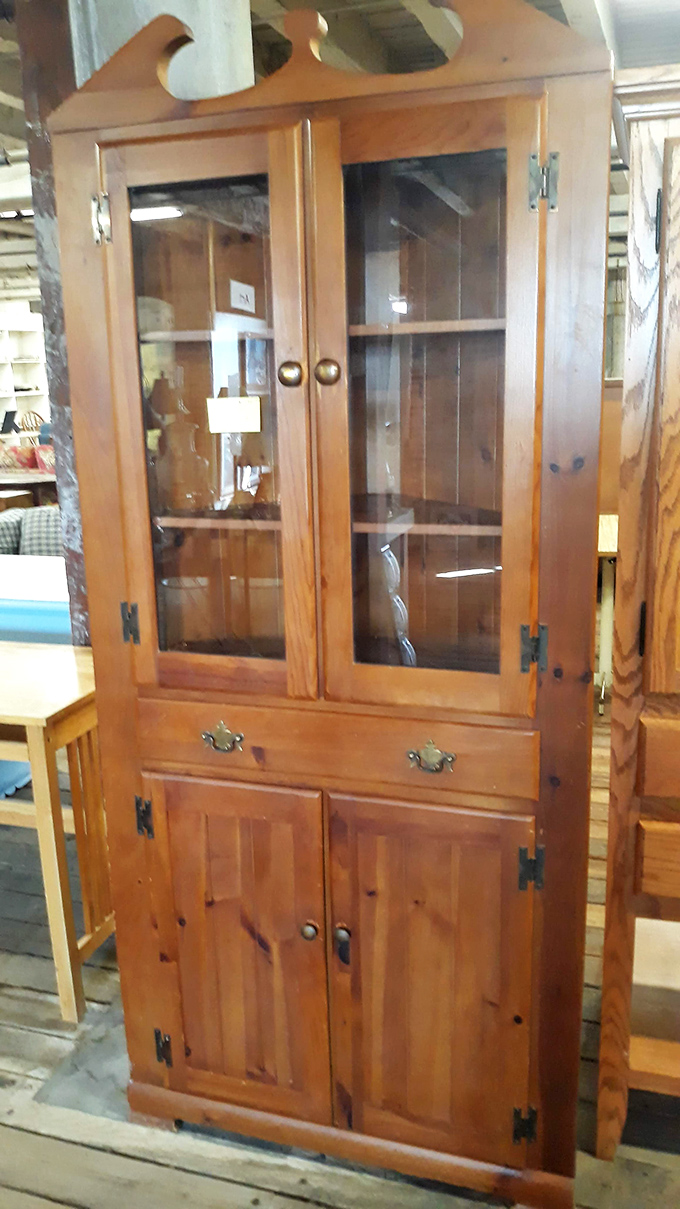 This pine cabinet isn't just storage&mdash;it's a statement that says "I appreciate craftsmanship and have excellent taste in display furniture."