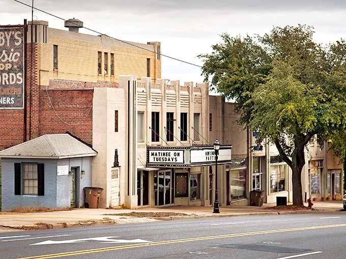 This classic theater marquee in Shelby still lights up the night, bringing neighbors together for affordable entertainment and community.