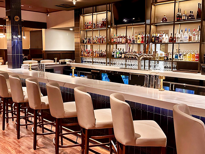 A bar that balances elegance with approachability, where Kentucky bourbon finds its rightful place of honor among global spirits.