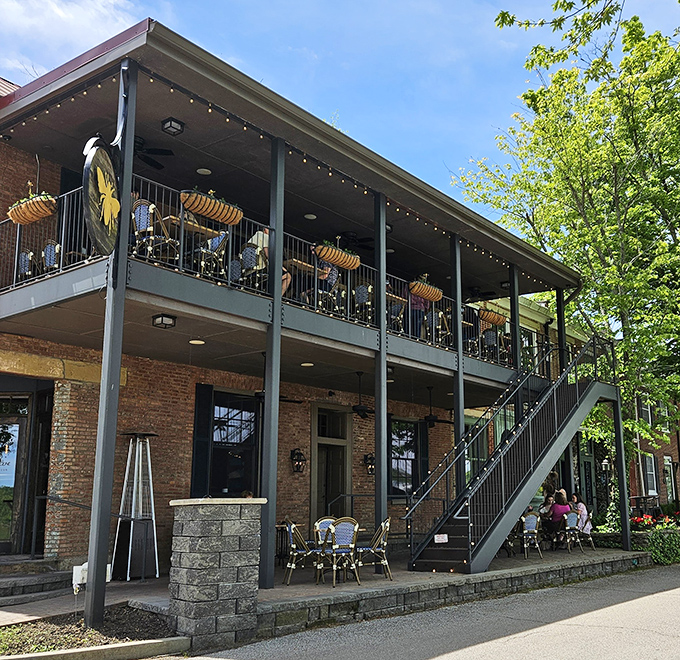 Beehive Augusta Tavern's inviting second-story porch offers the perfect perch for people-watching while enjoying Kentucky's culinary treasures.