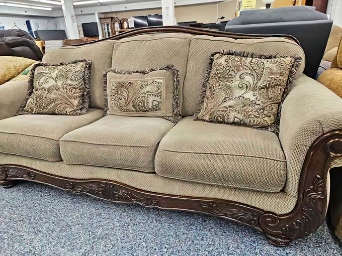 A sofa with enough personality to be the main character in your living room's story, complete with decorative pillows for supporting roles.