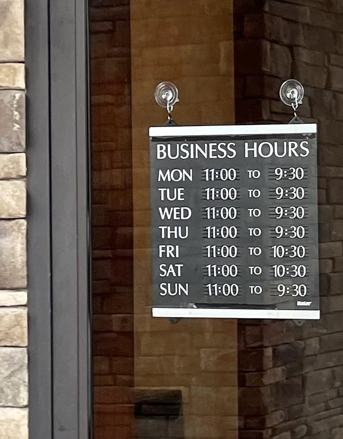 The business hours sign might as well read "Times When You Can Come Be Happier Than You Were Before You Ate Here."