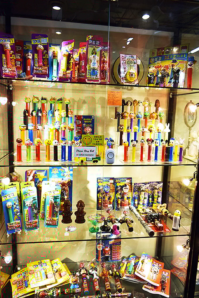 PEZ dispensers: the original collectible that makes adults smile as widely as children. Nostalgia in plastic form, arranged like tiny sentinels.