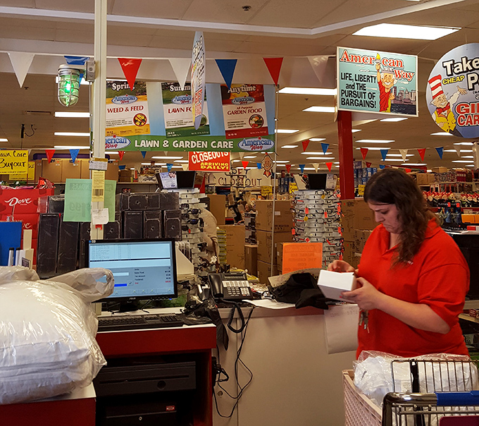 The final frontier: checkout, where friendly staff tally your treasures. Those patriotic banners overhead celebrate the true American dream – saving money.