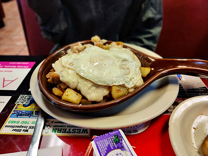 This country skillet doesn't just feed you—it hugs you from the inside out with layers of potatoes, eggs, and melted cheese.
