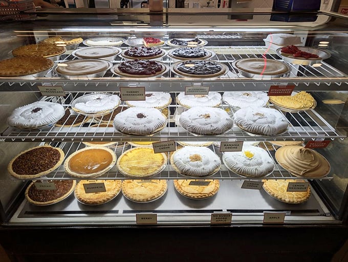 That pie case looks like a museum exhibit dedicated to cream pies, and honestly, that's exactly what it is.
