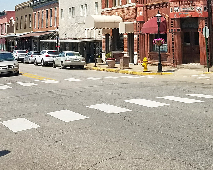 Downtown crosswalks see light traffic where pedestrians can actually cross streets without playing real-life Frogger.