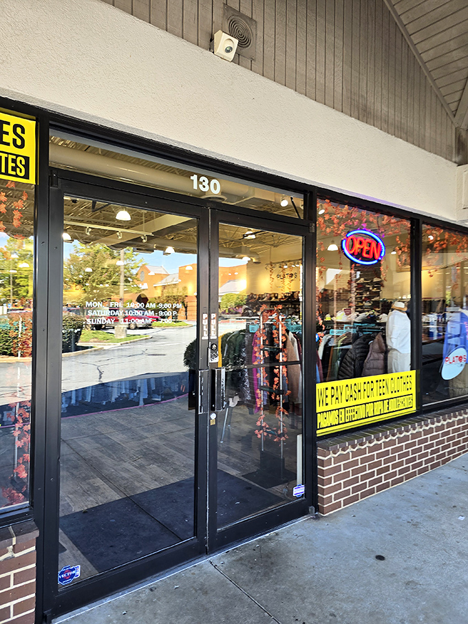 The gateway to greatness. Plato's Closet's entrance promises cash for your castoffs and treasures for your taking.