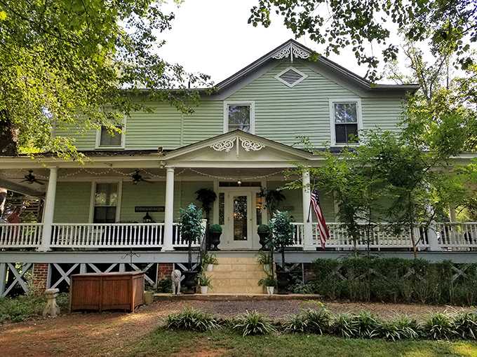 This mint-green Victorian B&B with its wraparound porch practically whispers, "Come sit with a glass of sweet tea and forget your deadlines."
