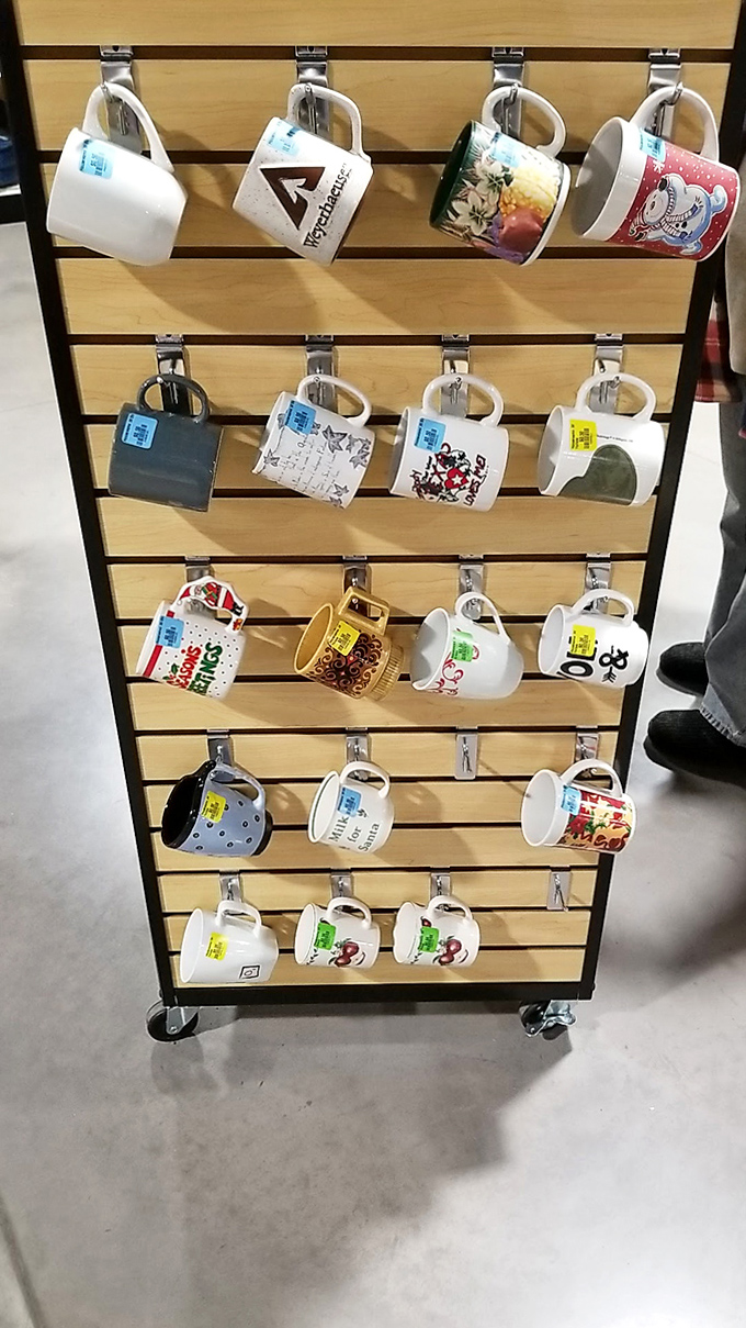 The mug wall &ndash; where coffee vessels from vacations, corporate events, and gift exchanges find new homes and fresh brews.