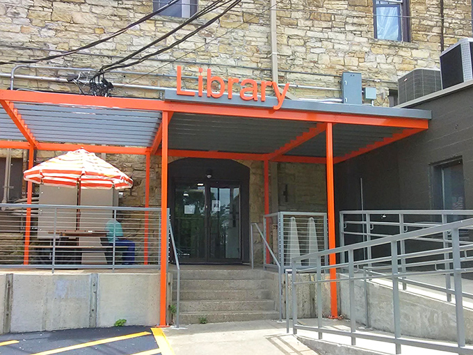 The Independence County Library's bright orange awning signals this isn't your grandmother's shushing library&mdash;it's a vibrant community hub for modern minds.