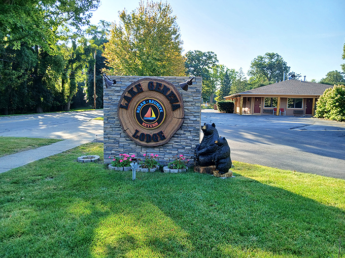 Lake Geneva Lodge welcomes with rustic elegance and a bear statue that's seen more selfies than a Hollywood star. The perfect basecamp for lake adventures.