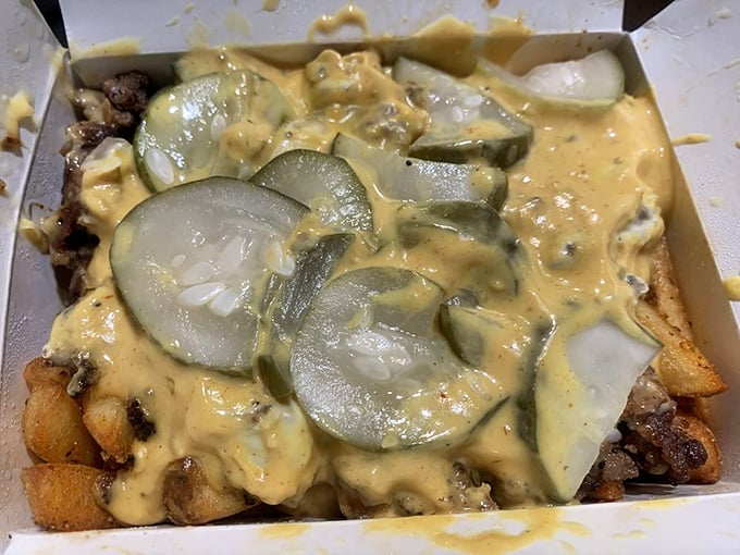 Loaded Smash Fries that blur the line between side dish and main event – a potato-based canvas for all things delicious.