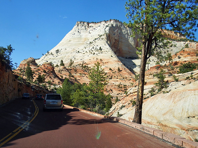 White-capped formations rise like desert meringues. The contrast between snow and sandstone creates nature's most perfect dessert.